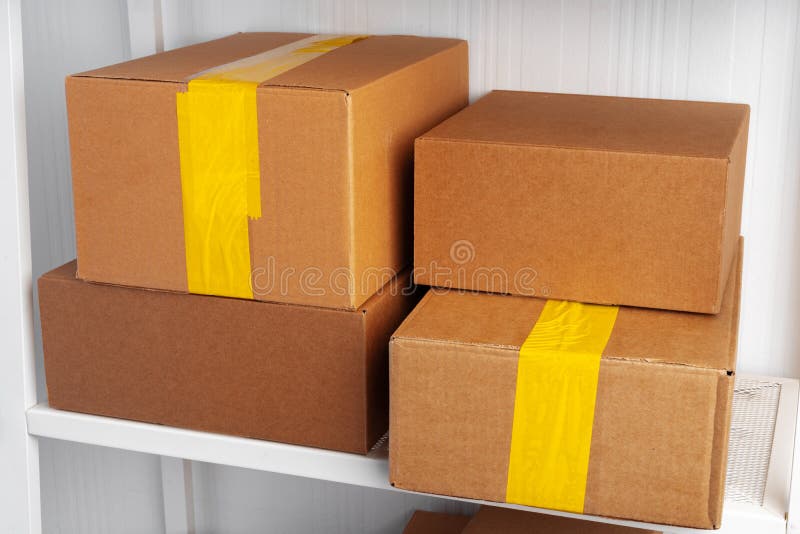 Stack of Cardboard Package Boxes on Wooden Rack Stock Image - Image of ...