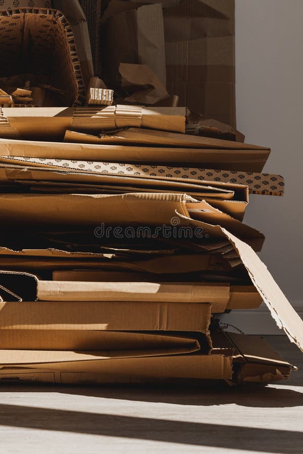 Stack of Cardboard Waste in Sunlight. Concepts of Paper Recycling and ...