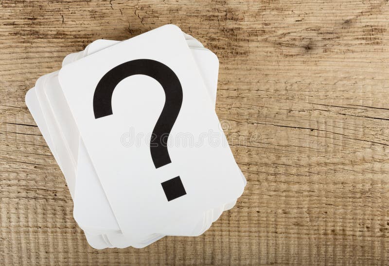 Stack of Cards with a Question Mark on Wooden Background Stock Image ...