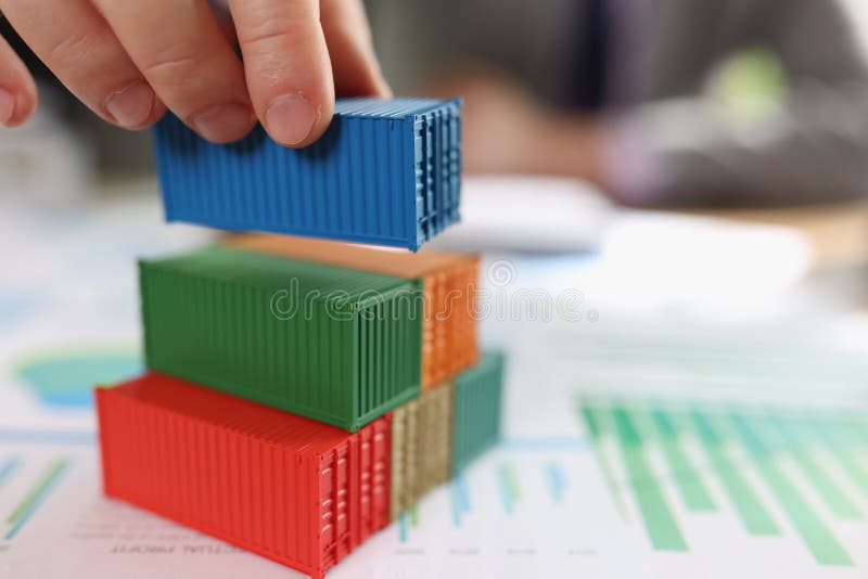 Stack of Cargo Containers on Financial Report Papers and Blurred ...