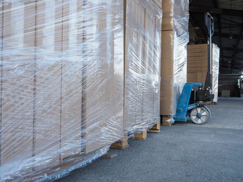 Truck Loading and Shipping. Stack of Carton Boxes on Pallet Ready for ...