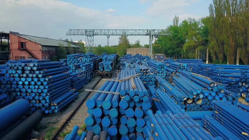 Stack of Cast Iron Pipes in Loading Area Waiting for Transportation ...