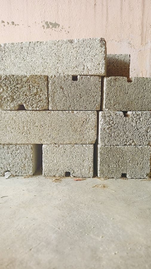 Stack of Cement Bricks Used for Construction Stock Image - Image of ...