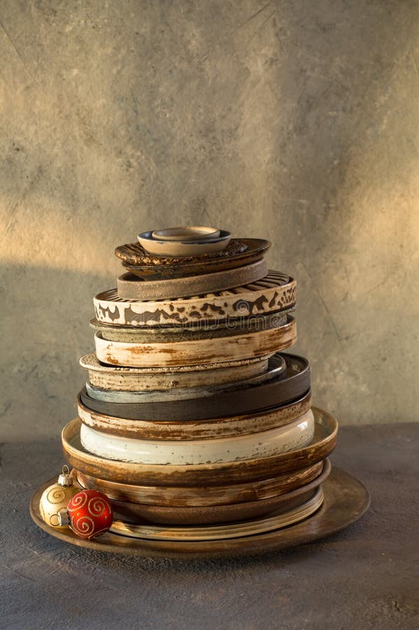 A stack of ceramic plates stock photo. Image of manufacture - 243250592
