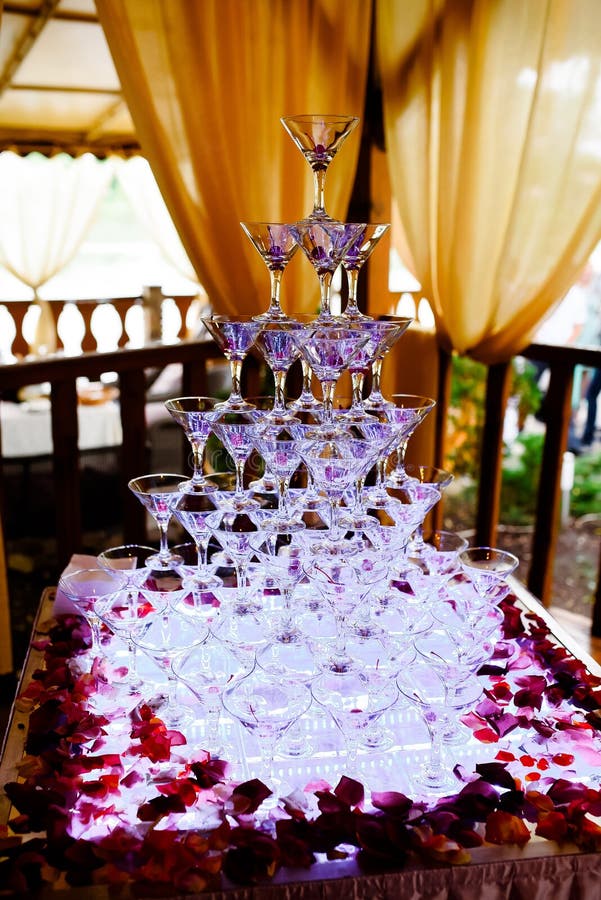 Stack of Champagne Glasses on Table in Wedding Party. Stock Photo ...
