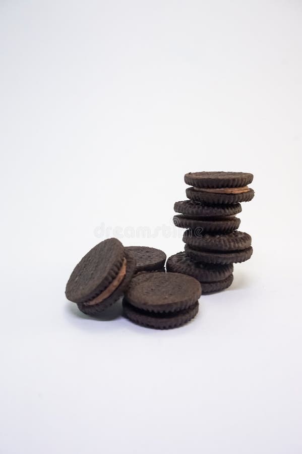 Stack of Chocolate Biscuits with Light Brown Cream on White Background ...