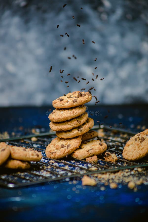 Stack of Chocolate Chip Cookies Also Sprinkles Falling on Them on a ...