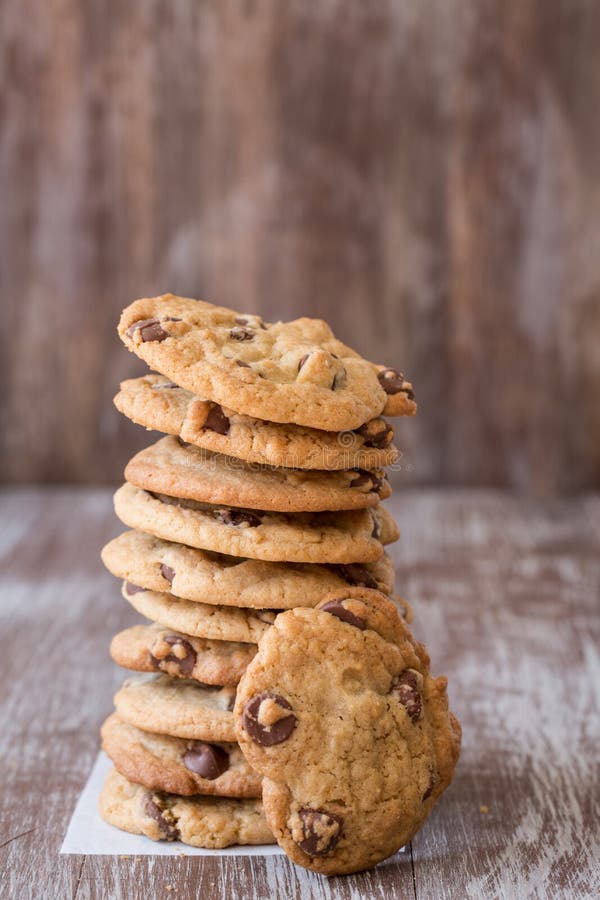 Stack of Chocolate Chip Cookies with One Leaning Stock Photo - Image of ...