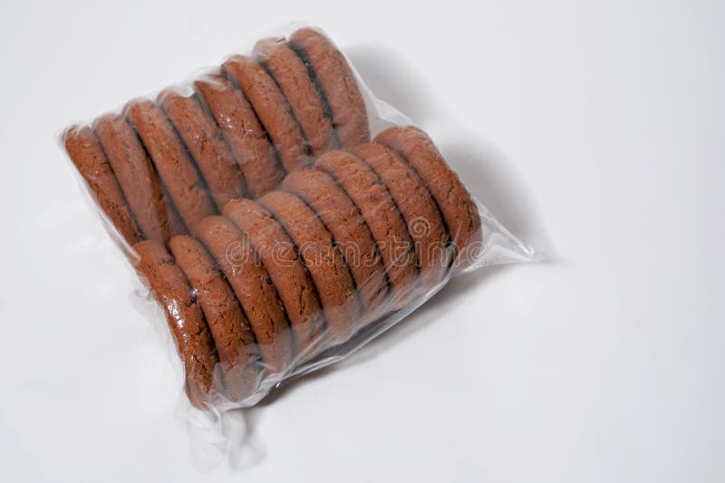 Stack of Chocolate Chip Cookies Sealed in Plastic Film on White ...