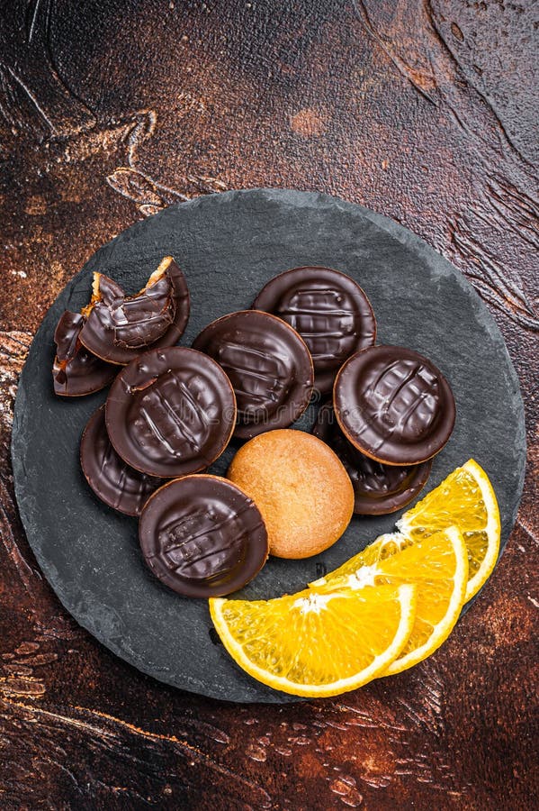 Stack of Chocolate Covered Round Jaffa Cookies with Orange Flavored ...