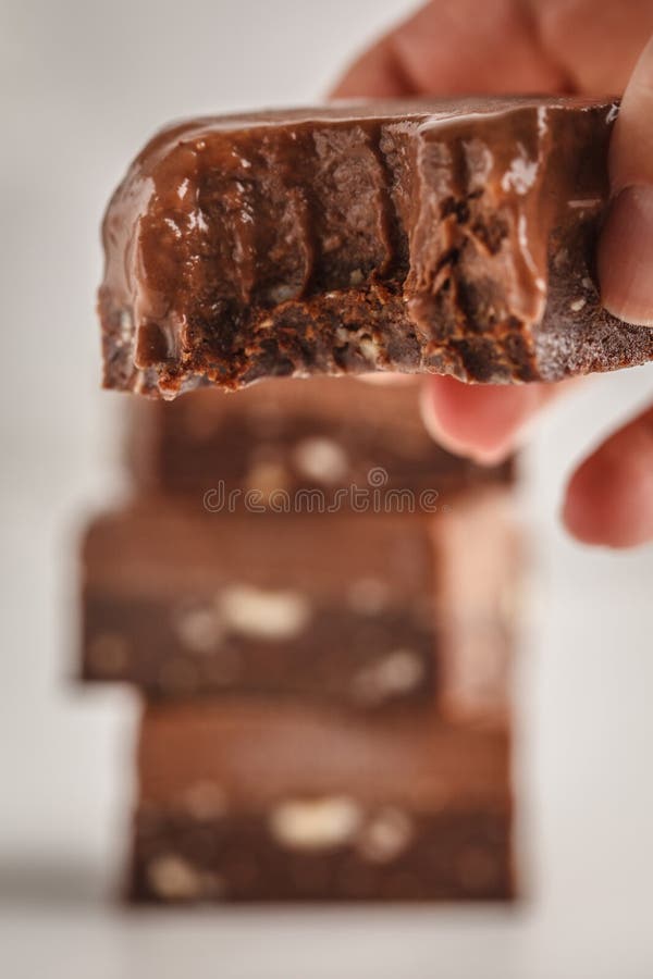 Stack of Chocolate Fudge Bars on White Background. Raw Vegan Dessrt ...