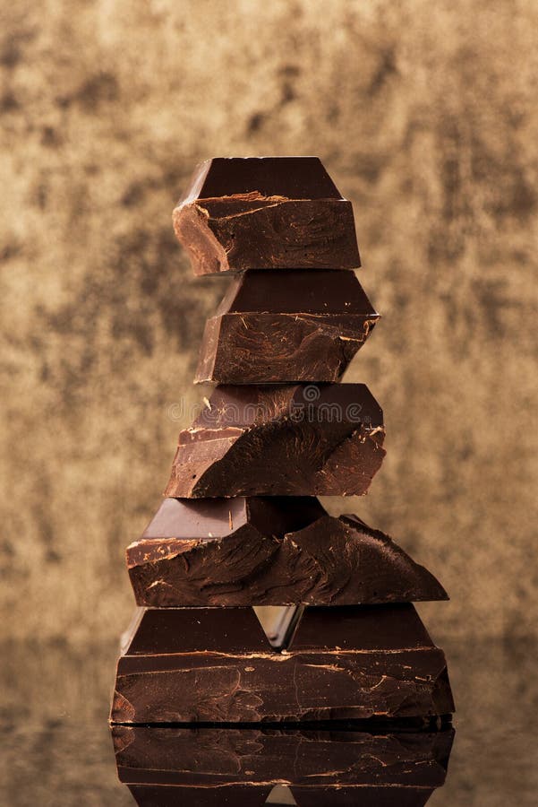 Stack Chocolate on a Stone Background Stock Photo - Image of broken ...