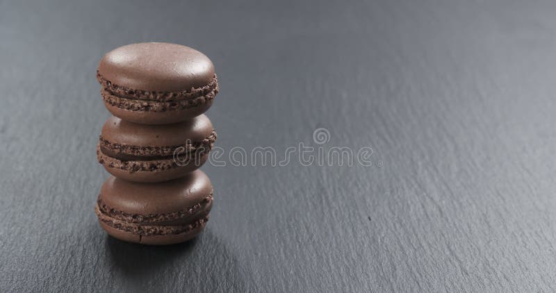 Stack of Chocolate Macarons on Slate Board Stock Photo - Image of bring ...