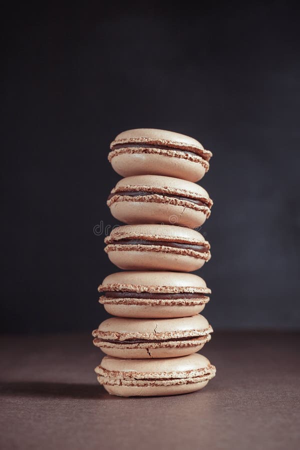 Stack of Chocolate Pastel Brown Macarons or Macaroons Stock Photo ...