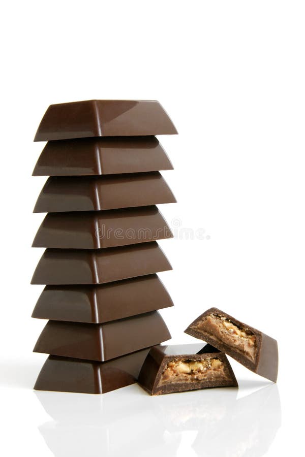 Stack of chocolate pieces stock image. Image of gift - 19386259