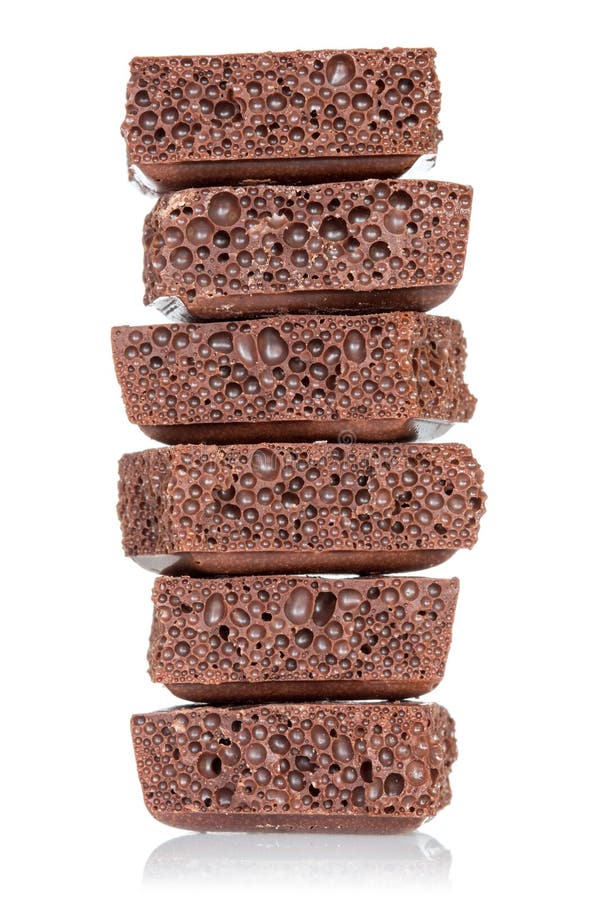 Stack of chocolate pieces stock photo. Image of isolated - 41934510