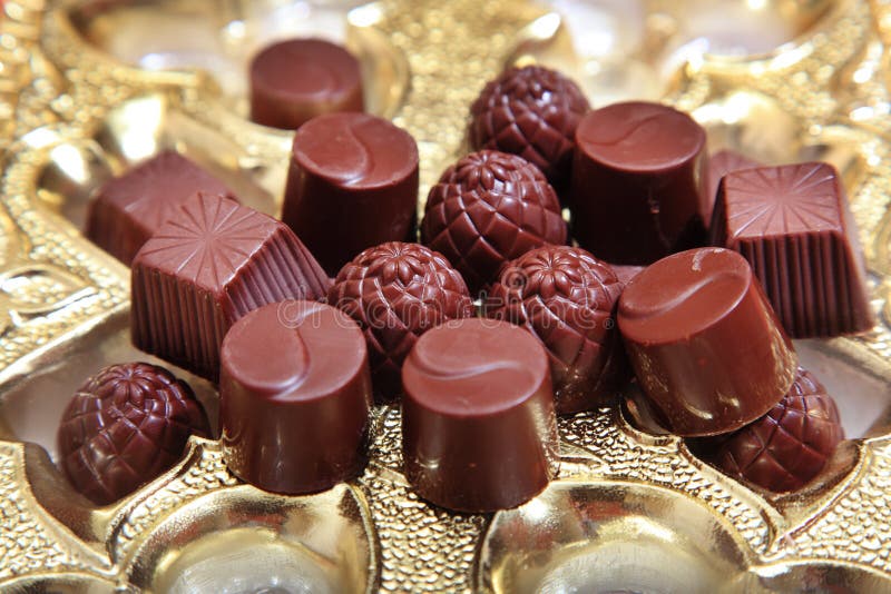 Stack of chocolate sweets stock image. Image of food, golden - 7644991