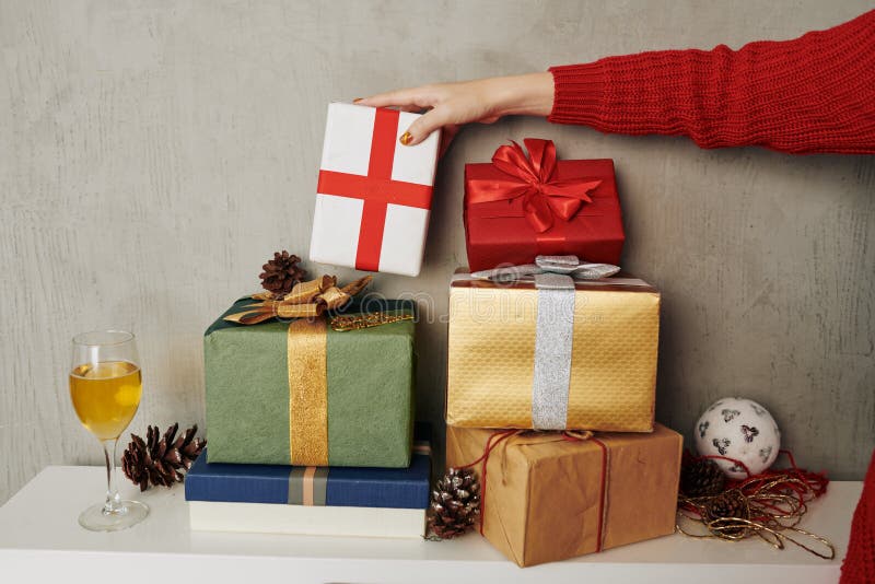 Stack of Christmas Presents Stock Photo - Image of giving, stack: 163070114