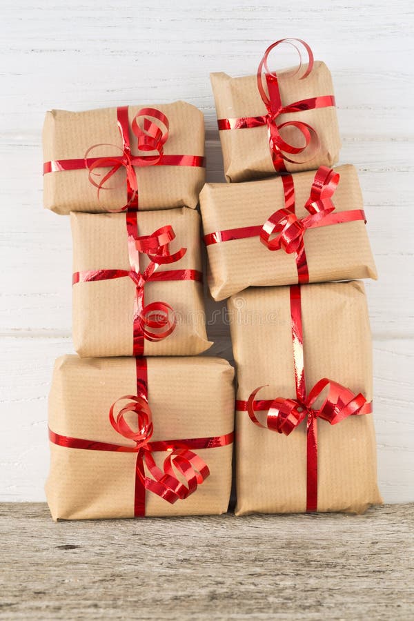 Stack of Christmas Presents on a Table Stock Image - Image of holiday ...