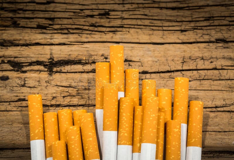 Close Up Stack of Cigarette on Wood Table Stock Photo - Image of danger ...