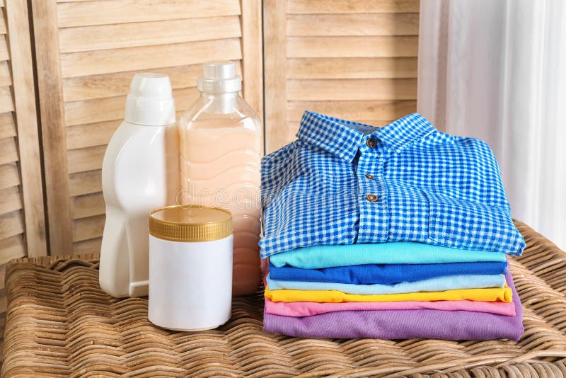 Stack of Clean Clothes and Bottles with Detergent Stock Image - Image ...