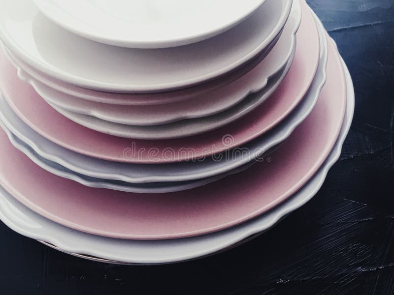 Stack of Clean Empty Plates on Black Background, Dishware and Table ...