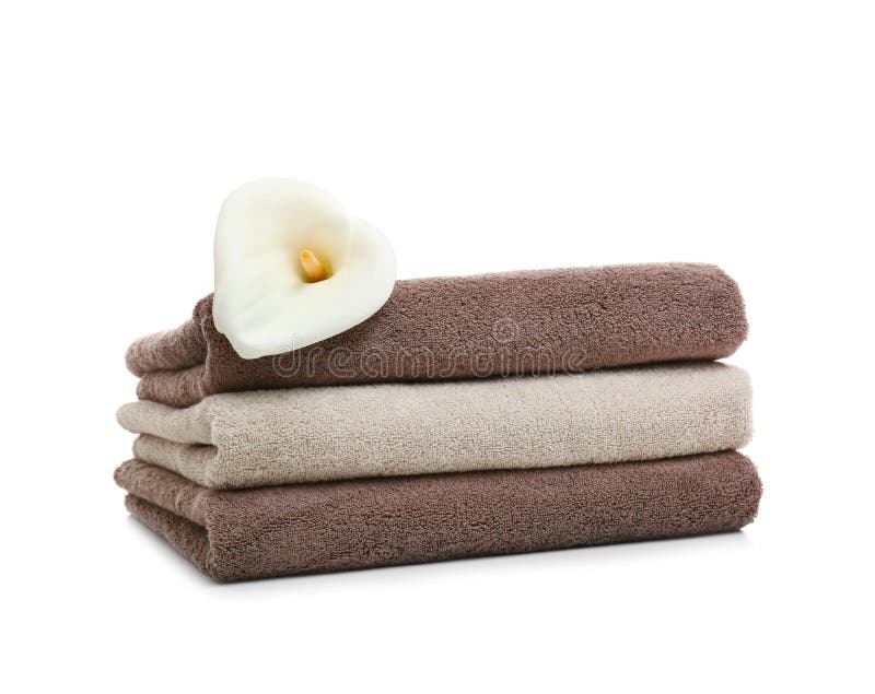 Stack of Clean Folded Towels with Flower Stock Photo - Image of massage ...