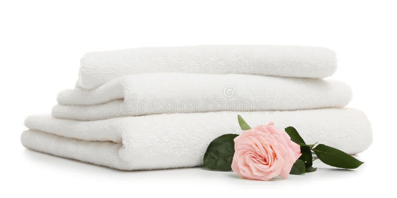 Stack of Clean Folded Towels with Flower Stock Image - Image of laundry ...