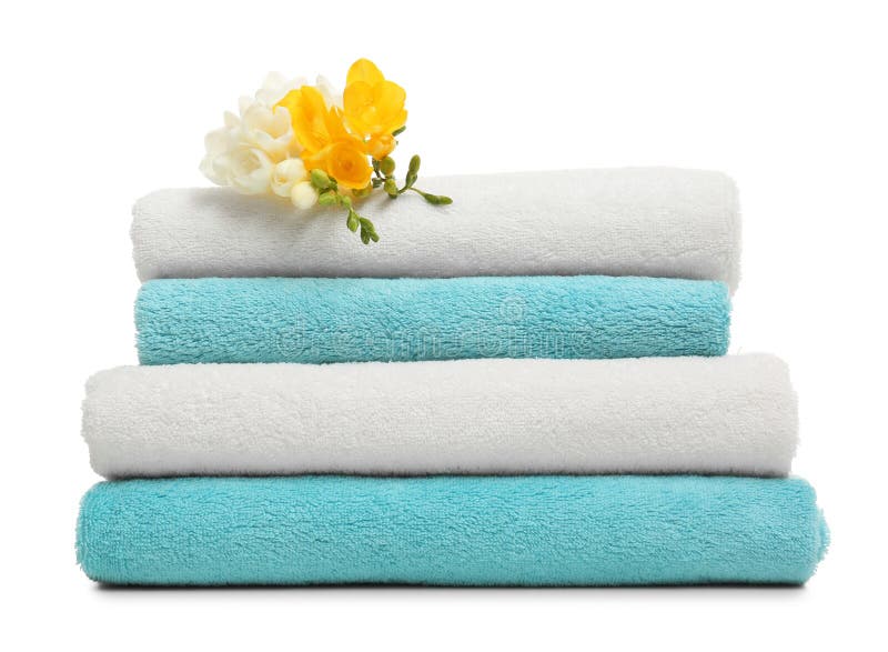 Stack of Clean Folded Towels with Flowers Stock Photo - Image of bath ...