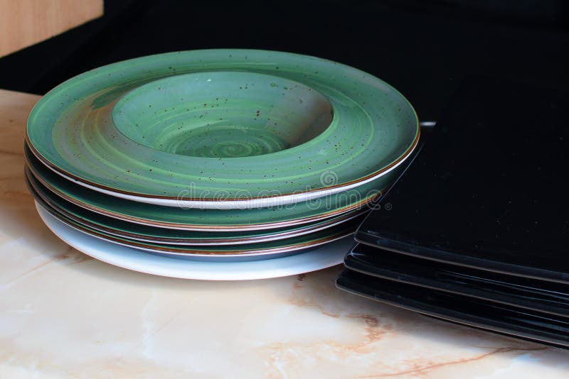 A Stack of Clean Plates is on the Table Stock Image - Image of clean ...