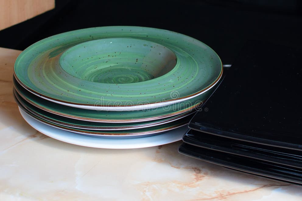 A Stack of Clean Plates is on the Table Stock Image - Image of clean ...