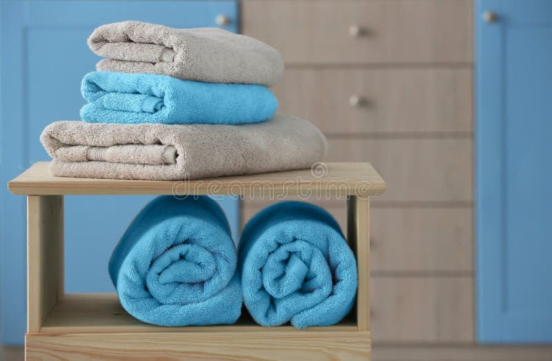 Stack of Clean Towels on Shelves Stock Photo - Image of laundry, home ...