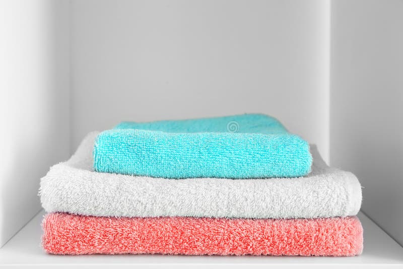 Stack of clean towels stock image. Image of furniture - 140132185