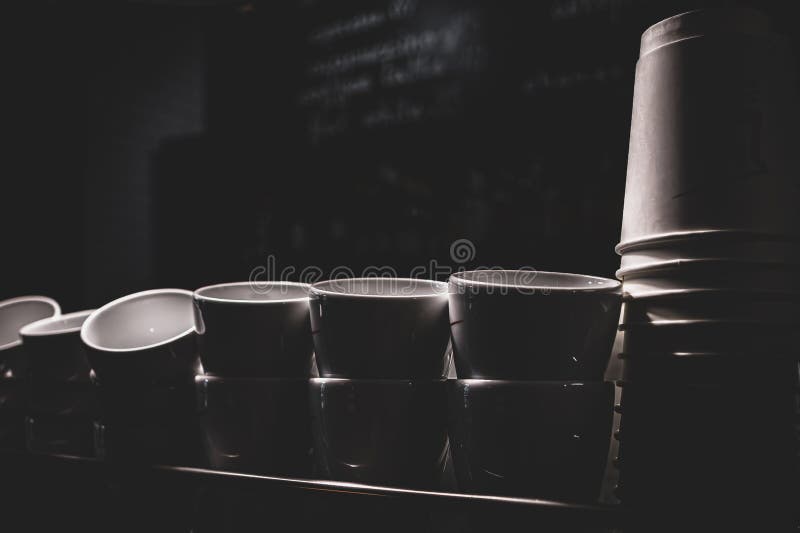 A Stack of Clean White Cups in a Coffee Shop Stock Photo - Image of ...