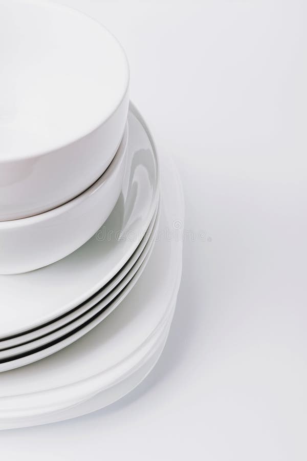 Stack of Clean White Dishes and Bowls Stock Photo - Image of plates ...