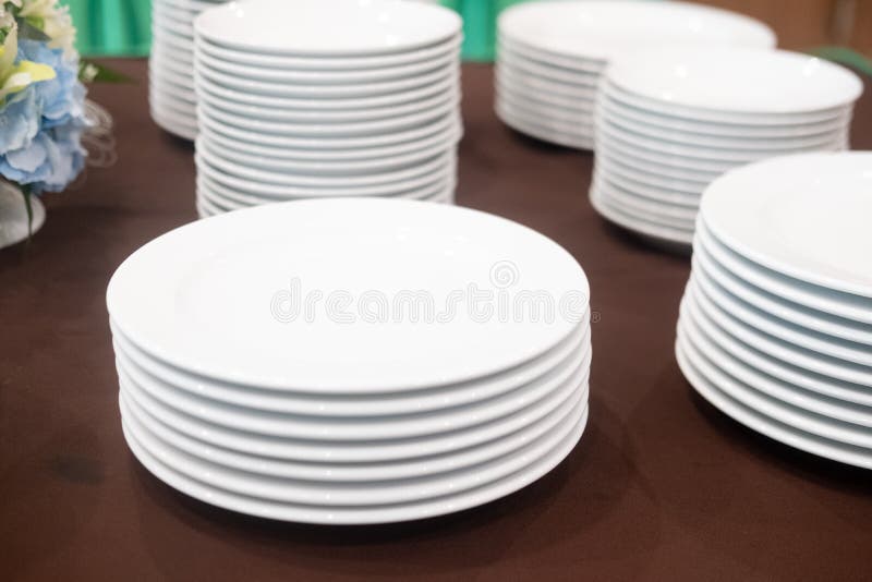 Stack of Clean White Plates in a Restaurant Stock Image - Image of ...