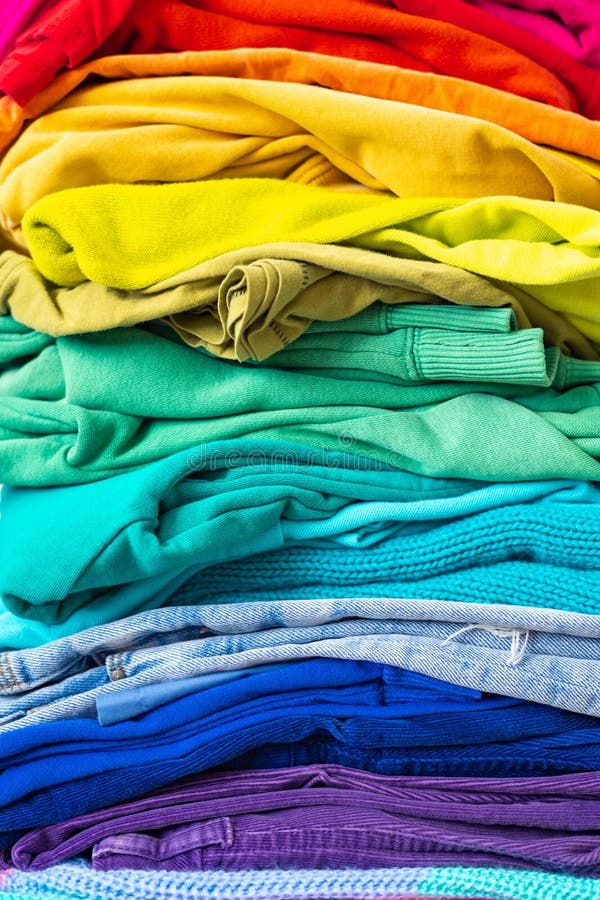 A Stack of Clothes in Different Colors. the Concept of Conscious ...