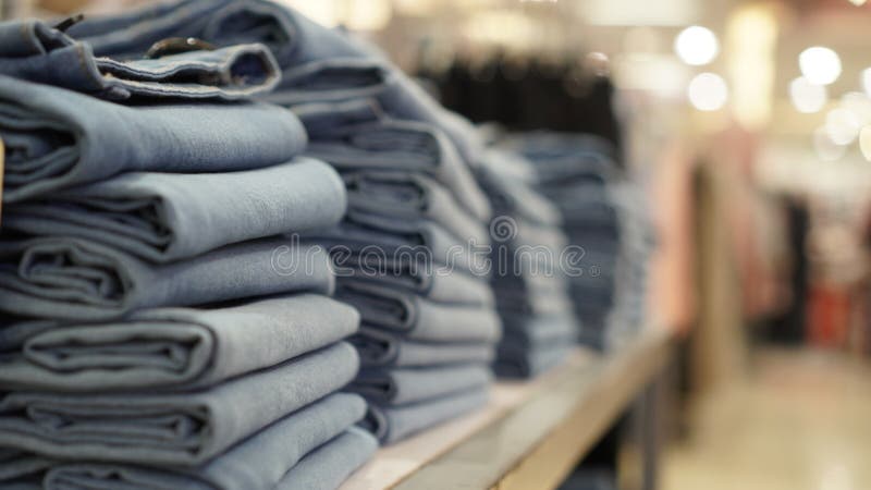Stack of Clothes are Displayed at Shopping Mall Stock Image - Image of ...