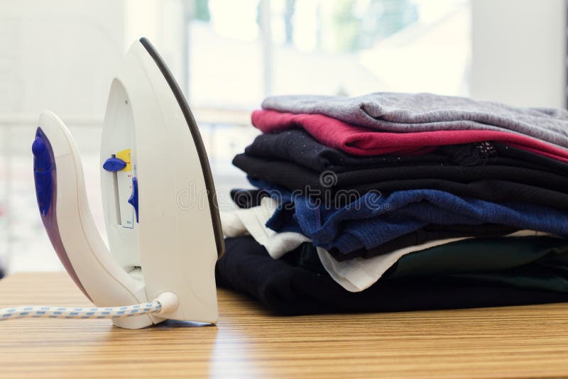 Stack of clothes stock image. Image of pile, furniture - 78057815