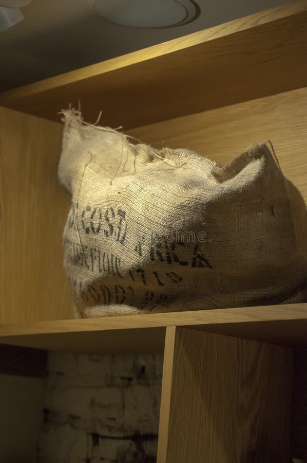 Stack of Coffee Bean-guny Sacks on Ceiling Shelf in Warehouse Stock ...
