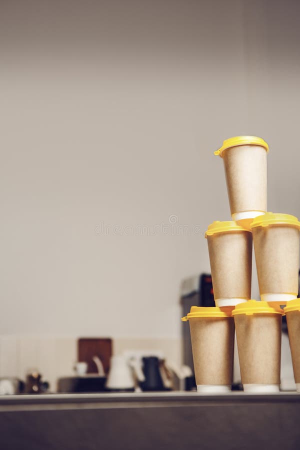 Stack of Coffee Cups on Counter Stock Photo - Image of office, setting ...