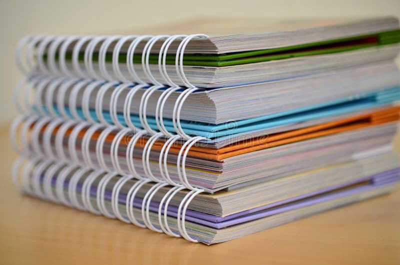 Stack of coil bound books stock image. Image of springs - 93558033