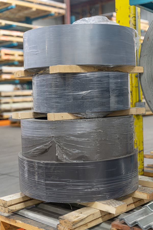 Stack of Coil Steel Metal Rolls in Metal Roofing Factory Stock Photo ...