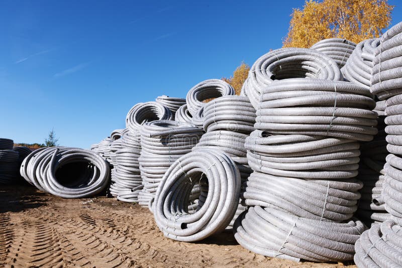 Stack of Coiled Plastic Pvc Polyethylene Corrugated Drainage Pipes for ...
