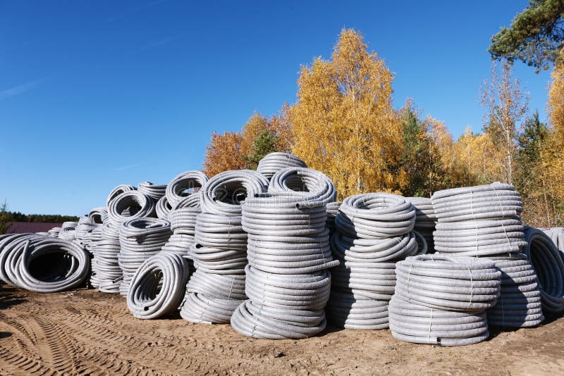Stack of Coiled Plastic Pvc Polyethylene Corrugated Drainage Pipes for ...