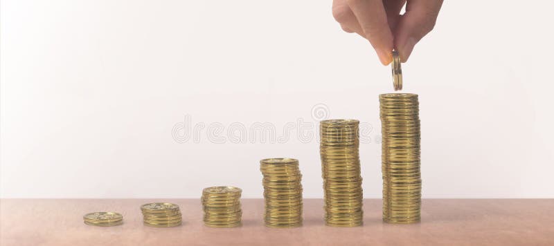 Stack Coin in Hand with Trading Graph, Financial Investment Concept ...