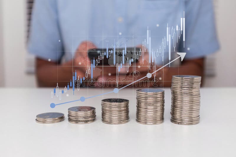 Stack of Coins in Ascending Order on the Table with a Business ...