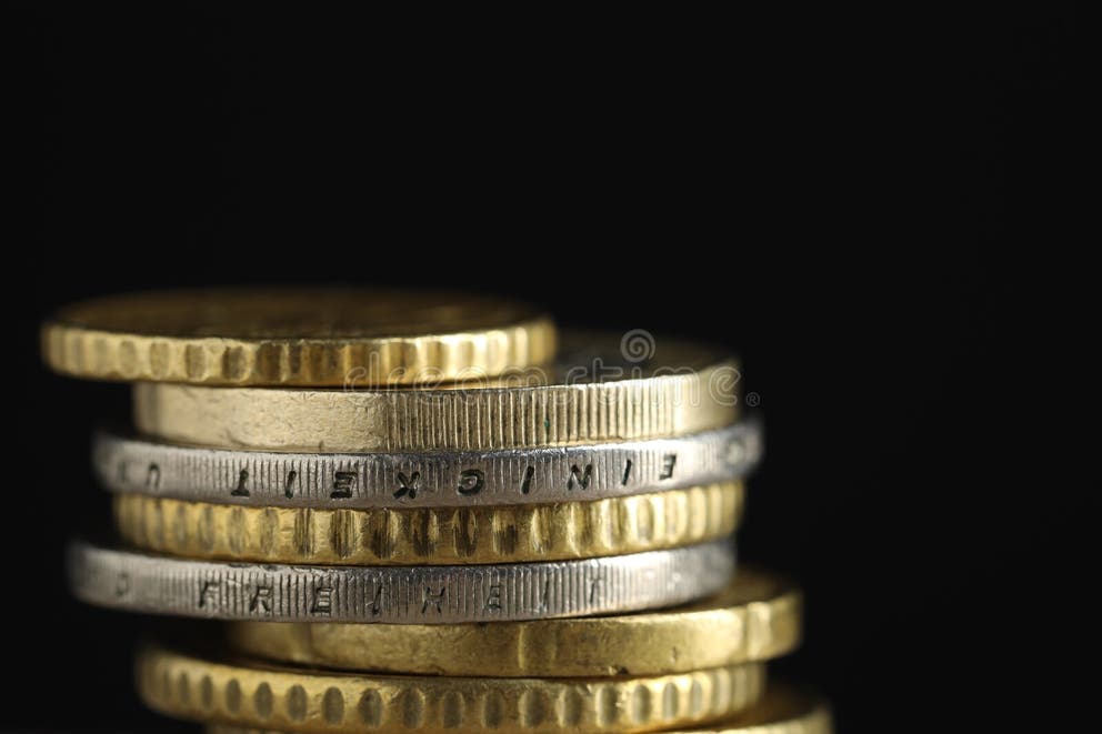 Stack of Coins on Black Background, Closeup. Salary Concept Stock Photo ...