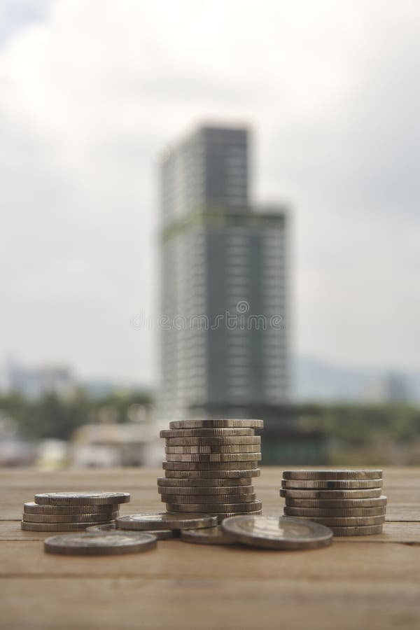Stack of Coins on Blur Building Background,coin Tower Stock Image ...