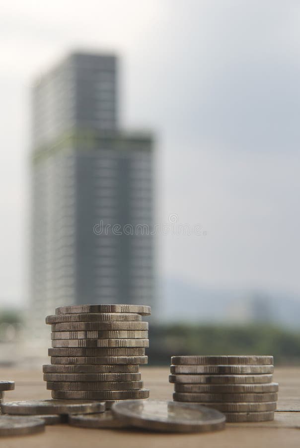 Stack of Coins on Blur Building Background,coin Tower Stock Photo ...